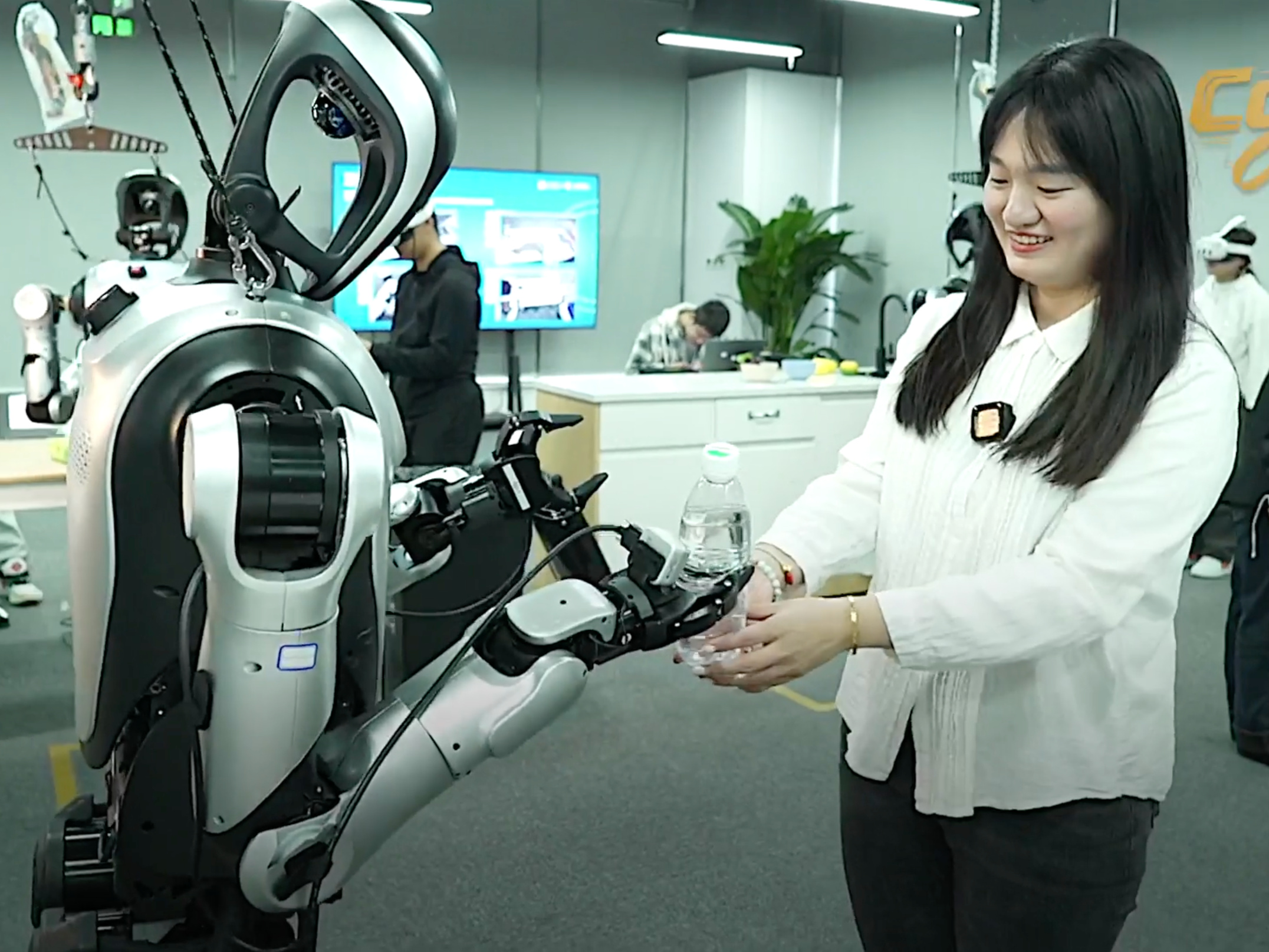 Discover the job of a robot 'coach' at China's largest humanoid ...