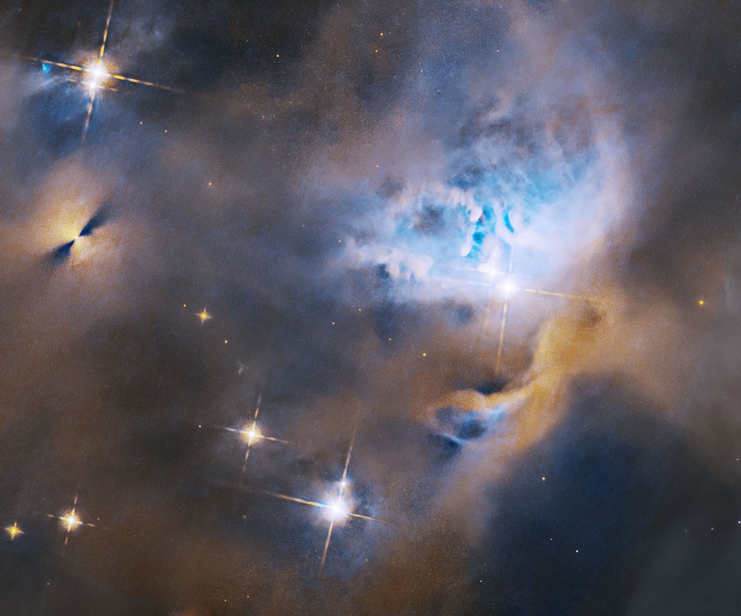 Hubble captures a dreamy scene created by young stellar objects ...